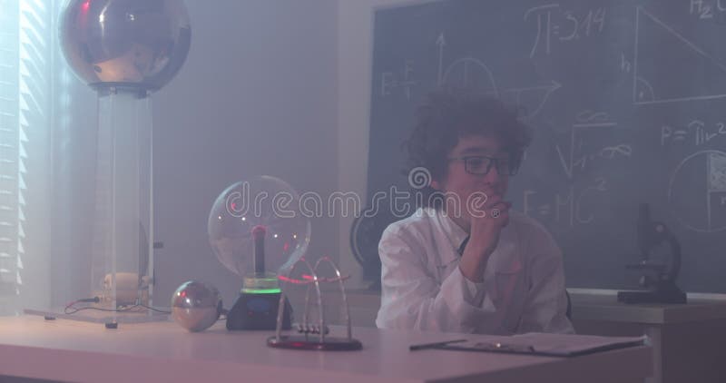 Schoolboy Experimenting in Physics Class. Young Student Doing Physics ...