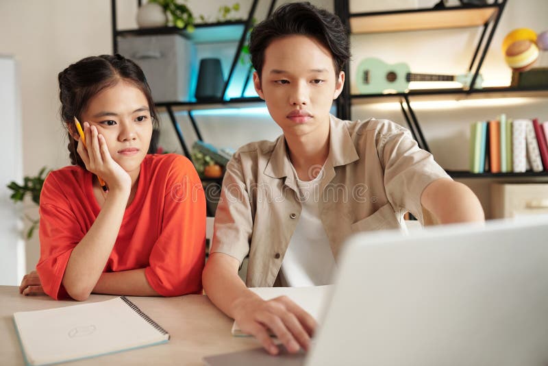 Schoolboy Explaining Topic To Classmate Stock Image - Image of sister ...