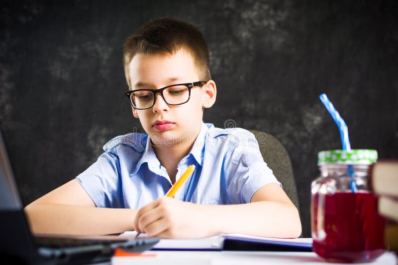 Schoolboy Finishing Homework at Home Stock Photo - Image of children ...