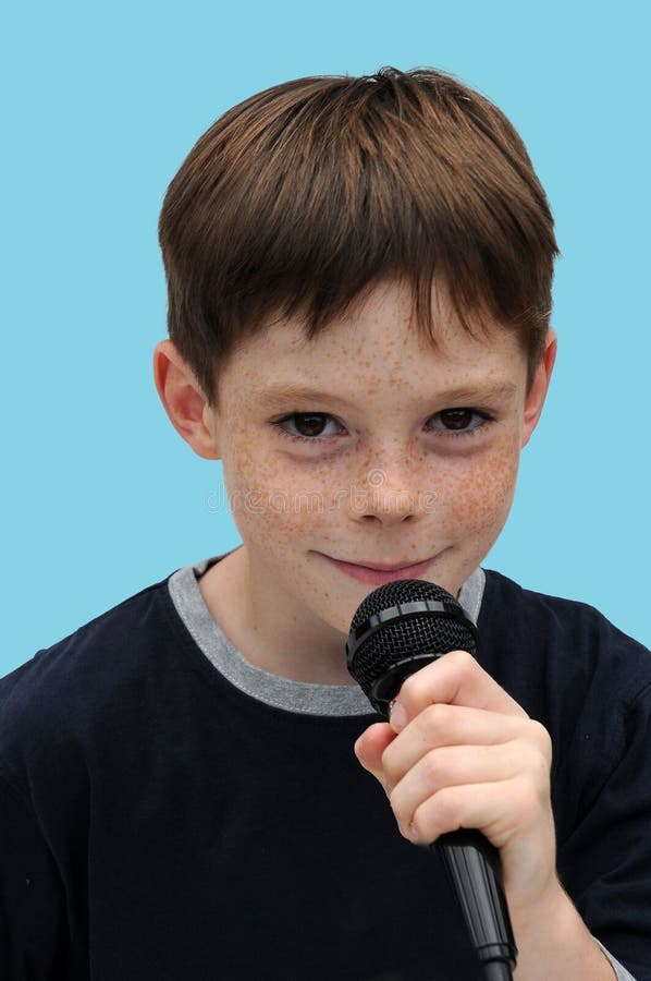 Schoolboy Giving a Performance and Entertains the People Stock Photo ...
