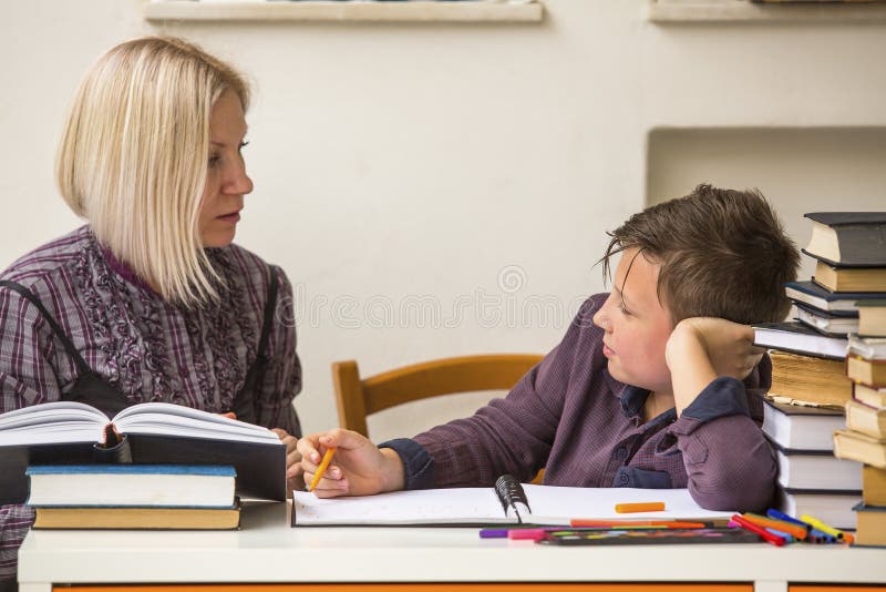 Schoolboy with His Tutor Do Homework. Helping. Stock Photo - Image of ...