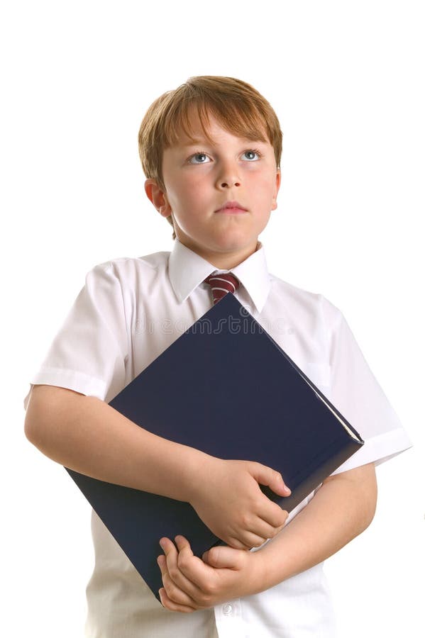 Schoolboy holding a book stock image. Image of education - 3617479