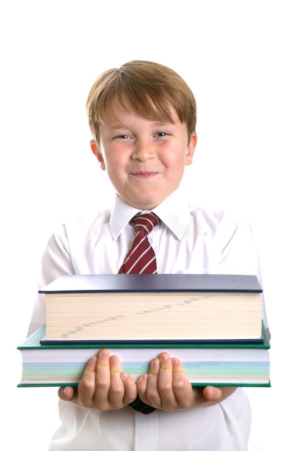 Schoolboy holding books stock photo. Image of face, laughing - 3669642