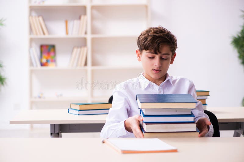Schoolboy Preparing for Exams in the Classroom Stock Photo - Image of ...