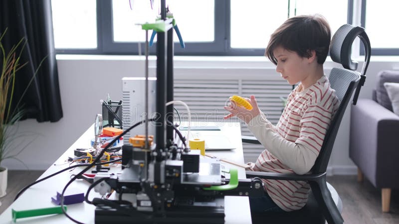 Schoolboy Prototyping Cogwheel for 3D Printer Stock Footage - Video of ...