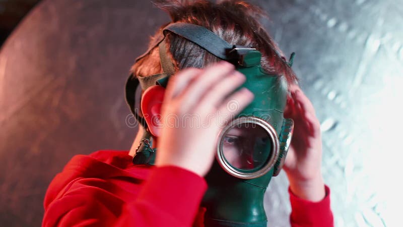 A Schoolboy Puts on a Gas Mask during Quarantine of the Virus at School ...