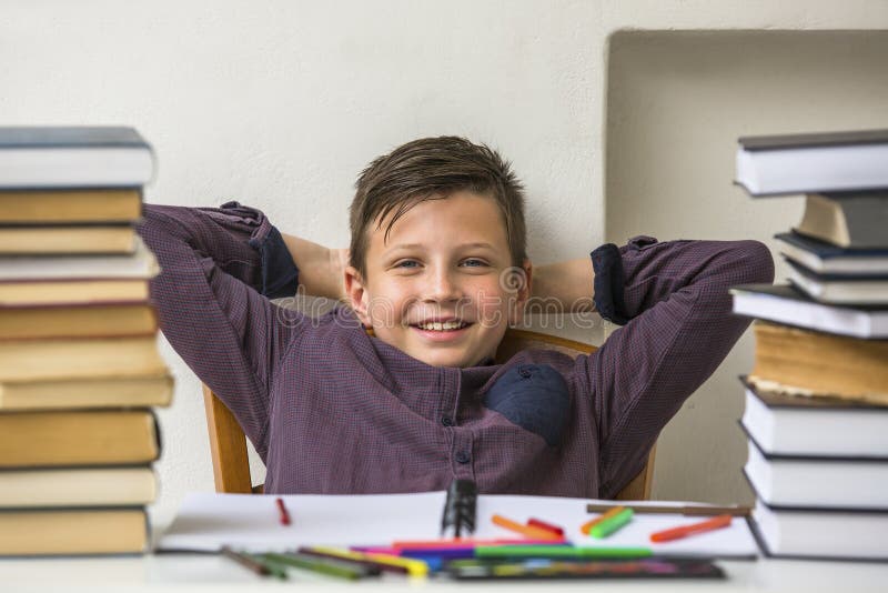 Schoolboy Resting during Homework. Happy. Stock Photo - Image of ...