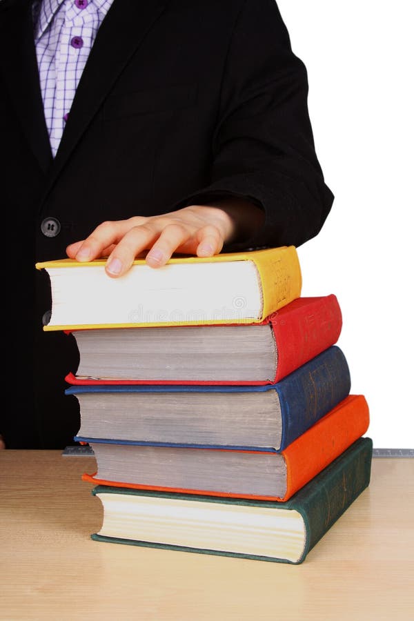 Schoolboy S Hand Lying on a Stack of Colorful Books Stock Photo - Image ...