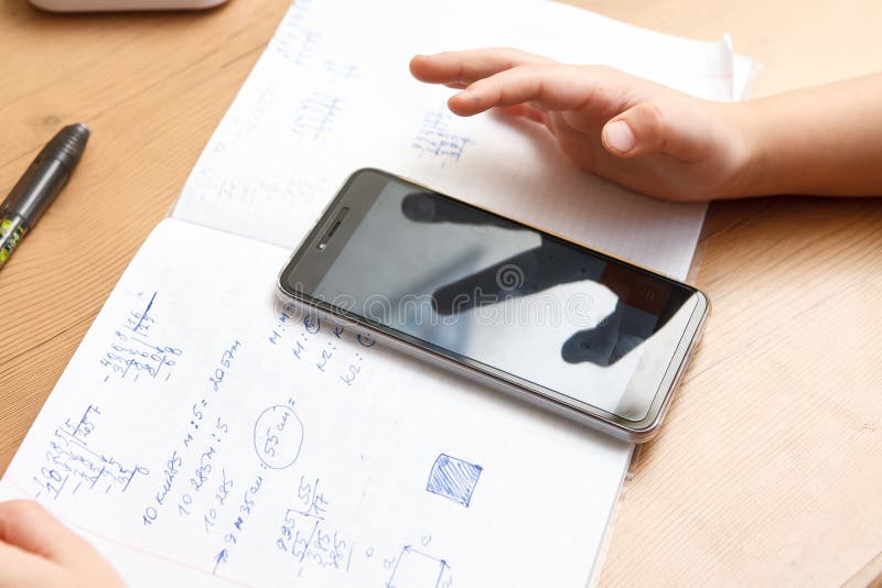 Schoolboy with Smartphone Doing Homework at Home Stock Image - Image of ...