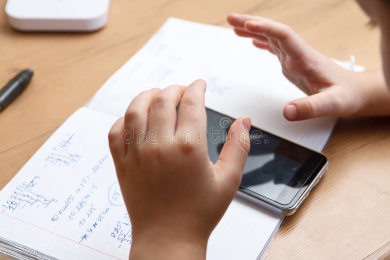 Schoolboy with Smartphone Doing Homework at Home Stock Image - Image of ...