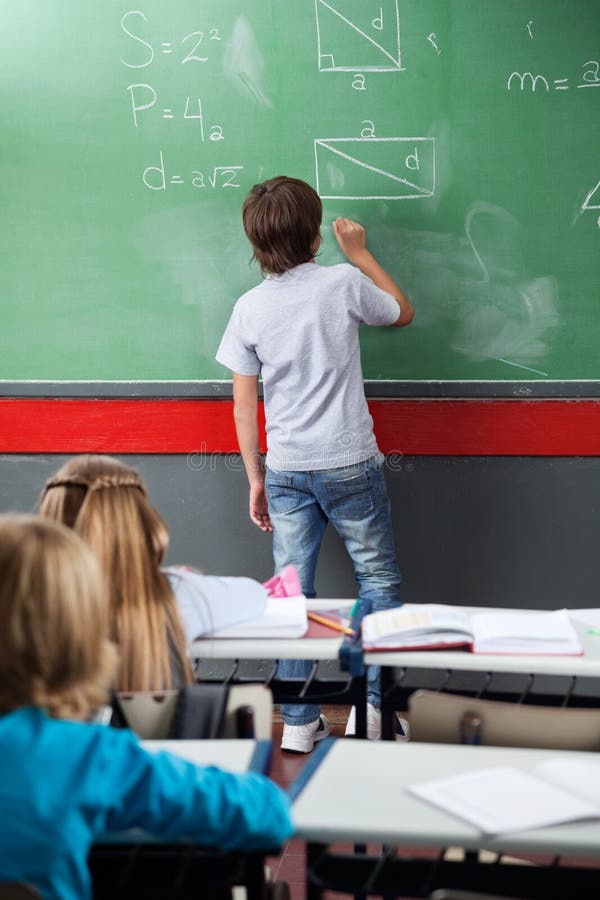 Schoolboy Solving Mathematics on Board Stock Image - Image of ...