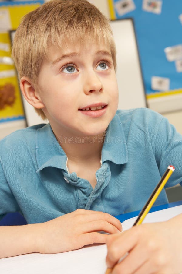 Boy doing school work stock image. Image of primary, grade - 4981171