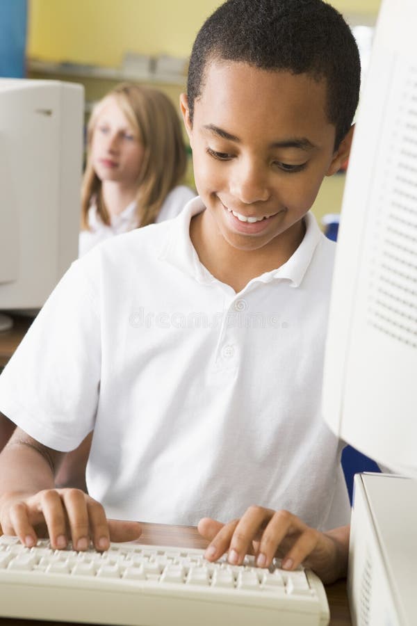 Schoolboy Studying in Front of a School Computer Stock Photo - Image of ...