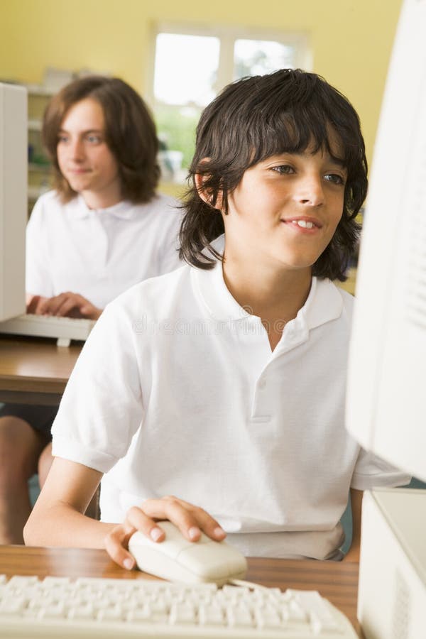 Schoolboy Studying in Front of a School Computer Stock Photo - Image of ...