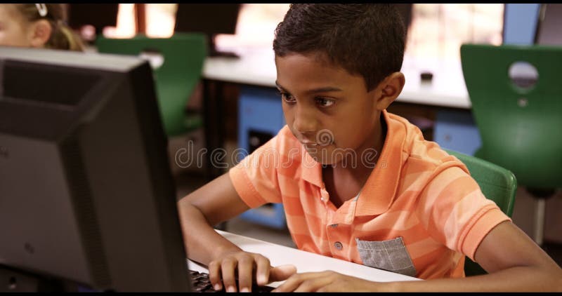 Schoolboy Studying on Personal Computer in Classroom Stock Footage ...