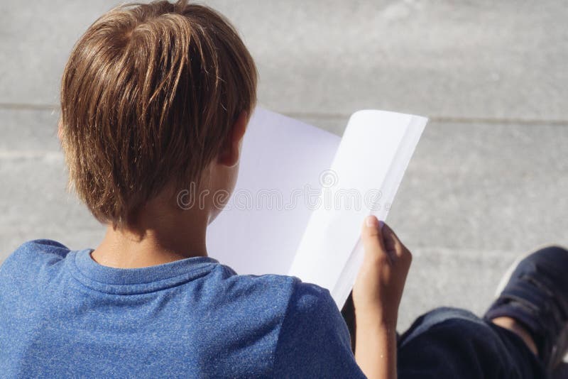 Schoolboy Studying, Reading Book Outdoors Stock Image - Image of ...