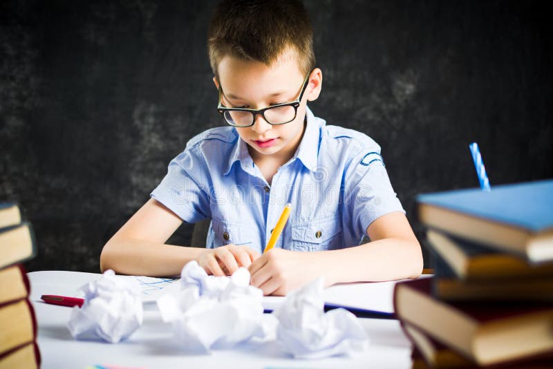 Schoolboy Finishing Homework at Home Stock Photo - Image of children ...