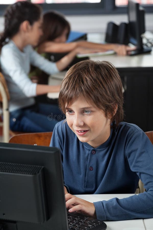 Kid using computer stock image. Image of college, computer - 9374997