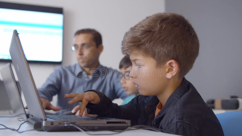 Schoolboys Having Fun during Computer Science Class Stock Video - Video ...