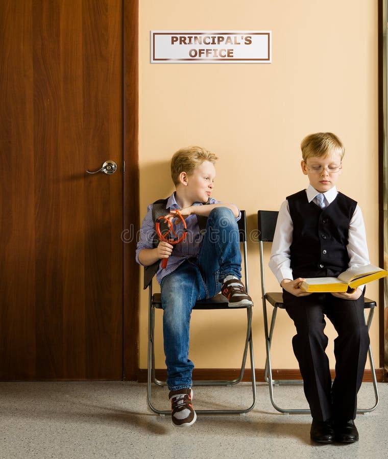 Schoolboys are Sitting beside the Principal S Stock Photo - Image of ...