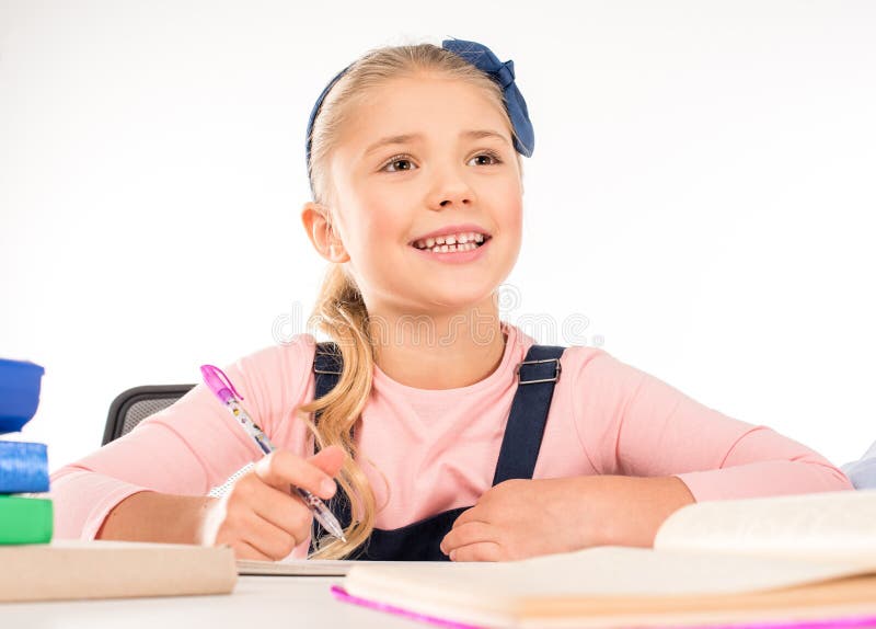 Schoolchild doing homework stock photo. Image of schooling - 84225266