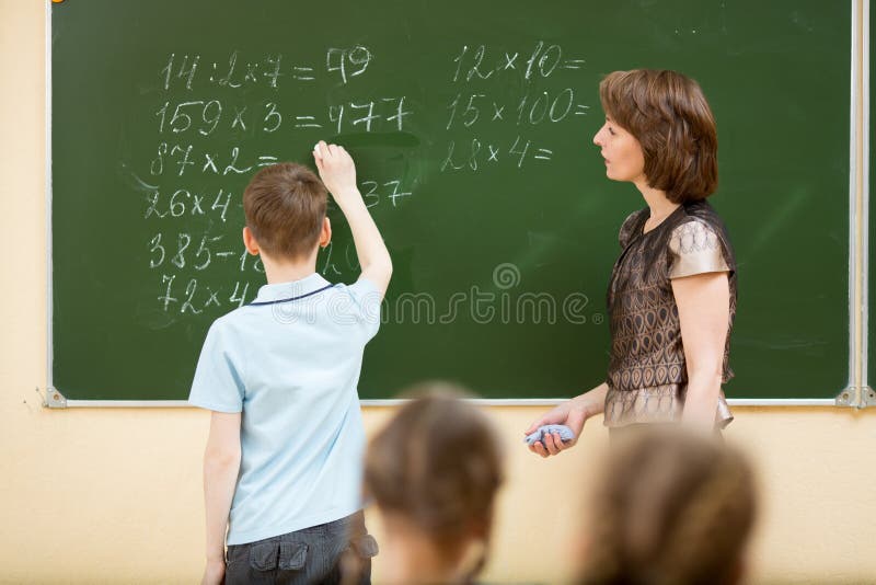 Schoolchildren in Classroom at Math Lesson Stock Photo - Image of ...
