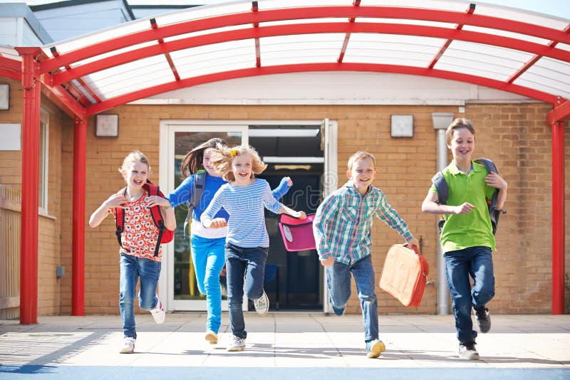 Schoolchildren Running into Playground at End of Class Stock Photo ...