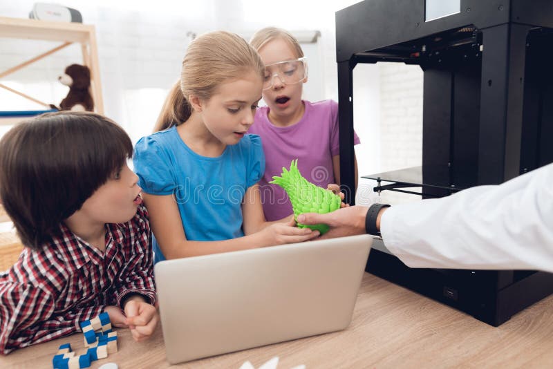 Children Print Different Items on a 3d Printer with a Teacher. Stock ...