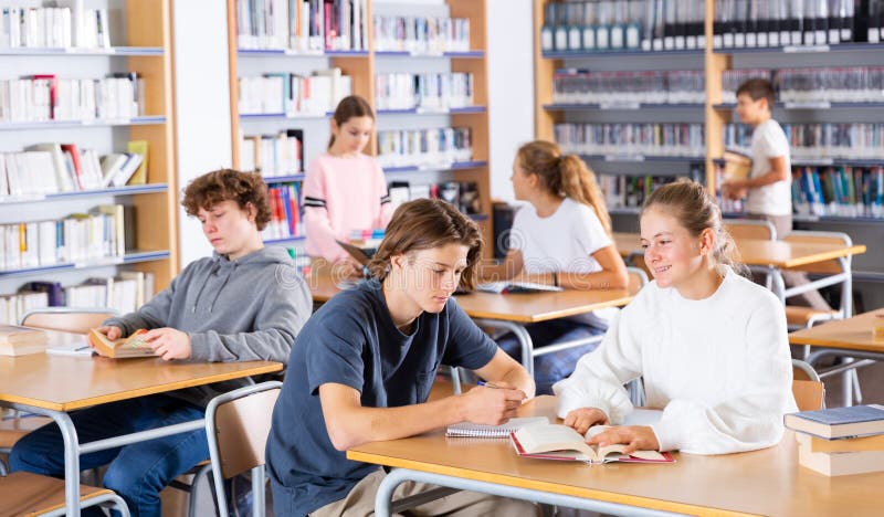 Schoolchildren Write Out a Synopsis from the Textbook Stock Photo ...
