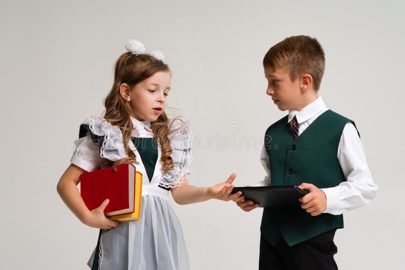 Schoolchildren in uniform stock photo. Image of emotion - 207705756