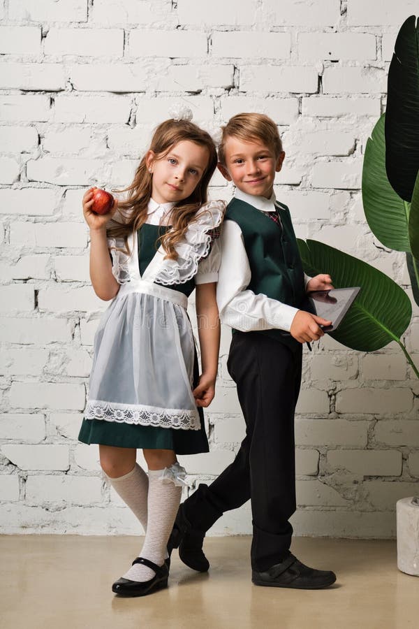 Schoolchildren in uniform stock image. Image of elementary - 202610251