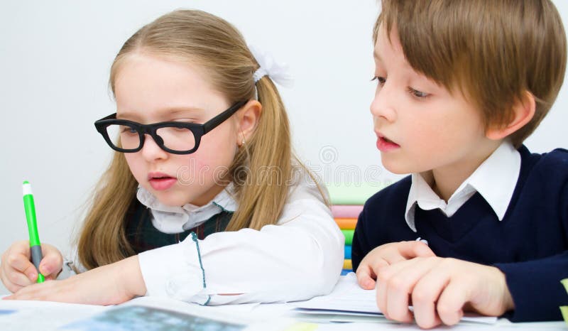 Schoolchildren Writing at School Stock Image - Image of school, group ...