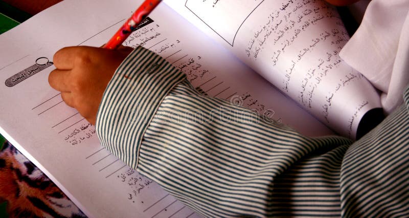 Schooldchild Writing in Arabic Stock Photo - Image of youngster ...