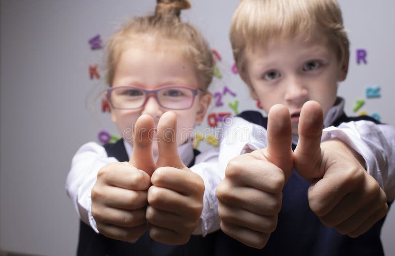Boy and Girl Showing Thumb-up, Math Background Stock Photo - Image of ...