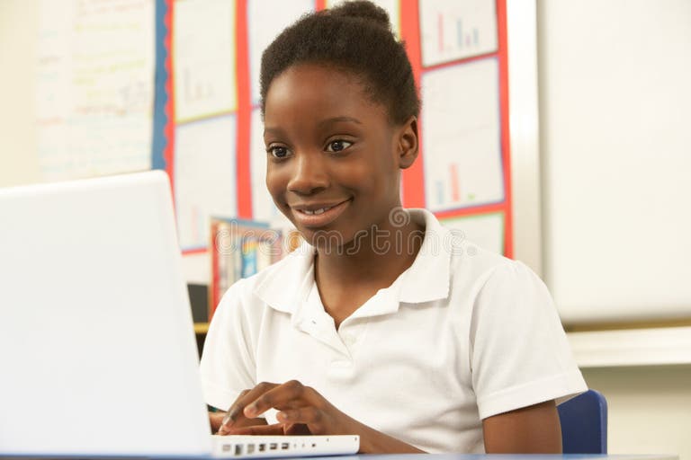 Schoolgirl in it Class Using Computer Stock Photo - Image of ...