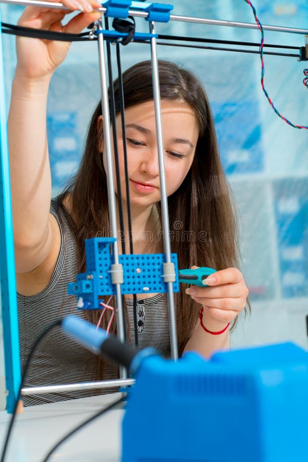 Schoolgirl in the Classroom Design and Development of Robots Stock ...