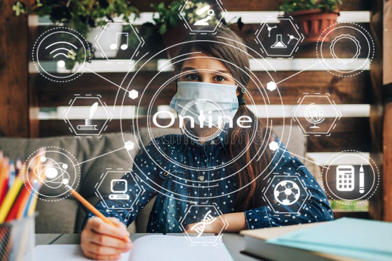Schoolgirl Doing Homework Looking at Computer with Medical Mask on Her ...