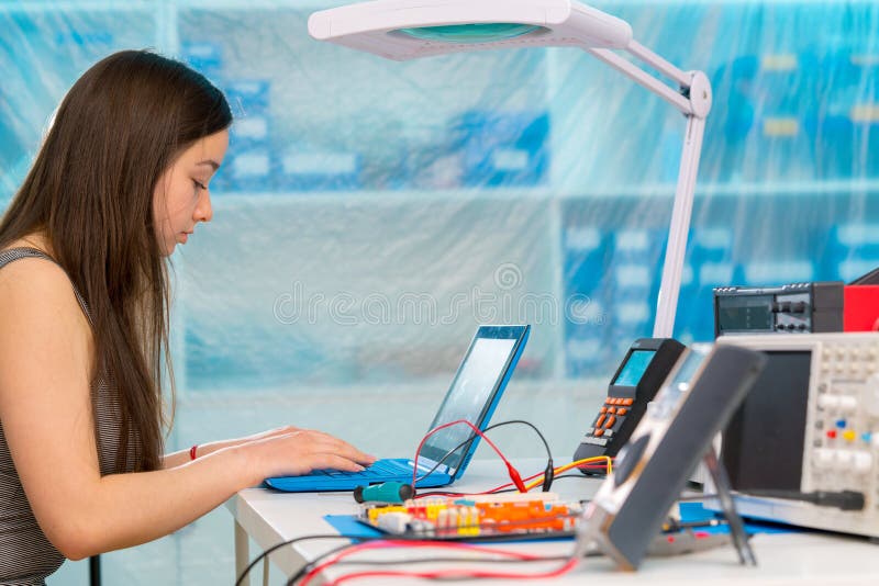 Schoolgirl in Electronics Class Stock Photo - Image of person, hardware ...