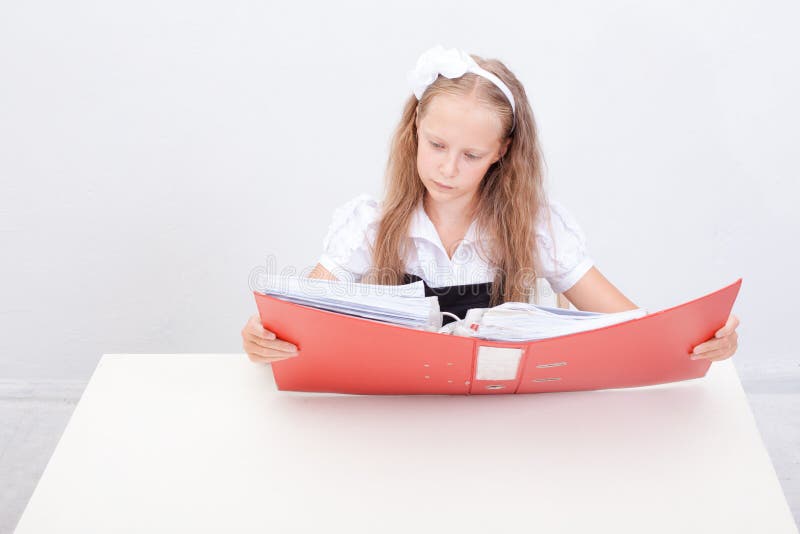 Schoolgirl with folders stock photo. Image of child, pretty - 58466988