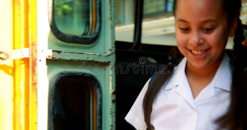 Schoolgirl Getting Down from Bus Stock Video - Video of schoolgirl ...