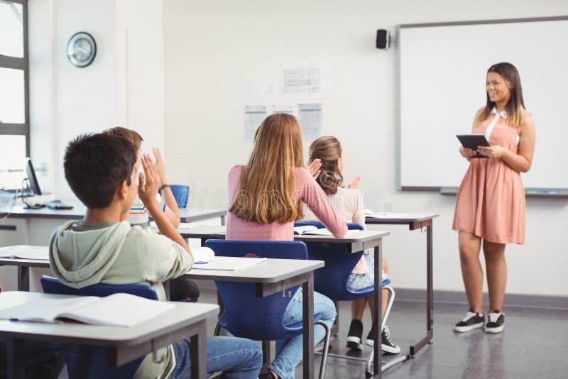 Schoolgirl Giving Presentation in Classroom Stock Photo - Image of ...