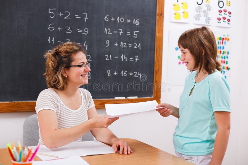 Schoolgirl Giving or Receiving Math Test Paper Stock Photo - Image of ...
