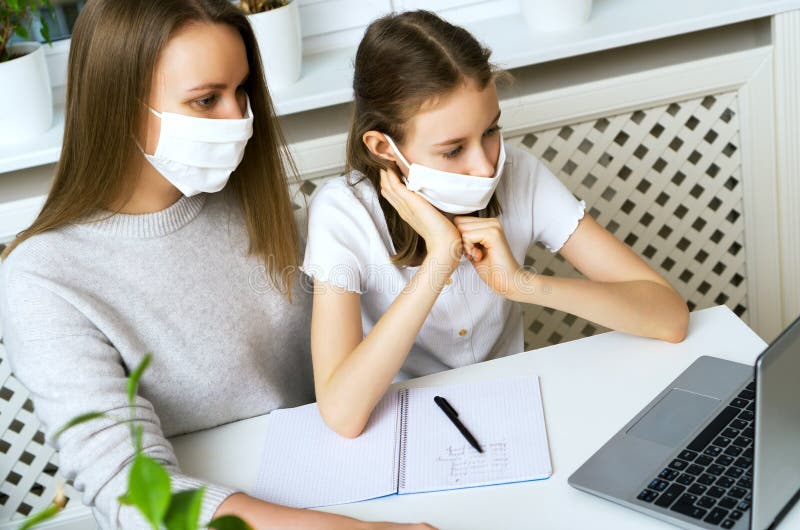 Schoolgirl with Her Mother at Distance Learning. Stock Image - Image of ... Schoolgirl with Her Mother at Distance Learning. Stock Image - Image of ...