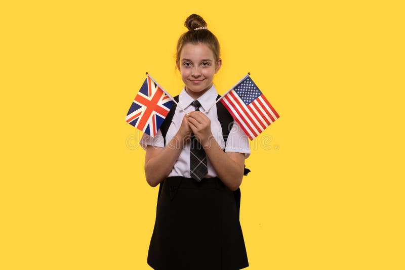 Schoolgirl Holds Both the British and American Flags Stock Photo ...