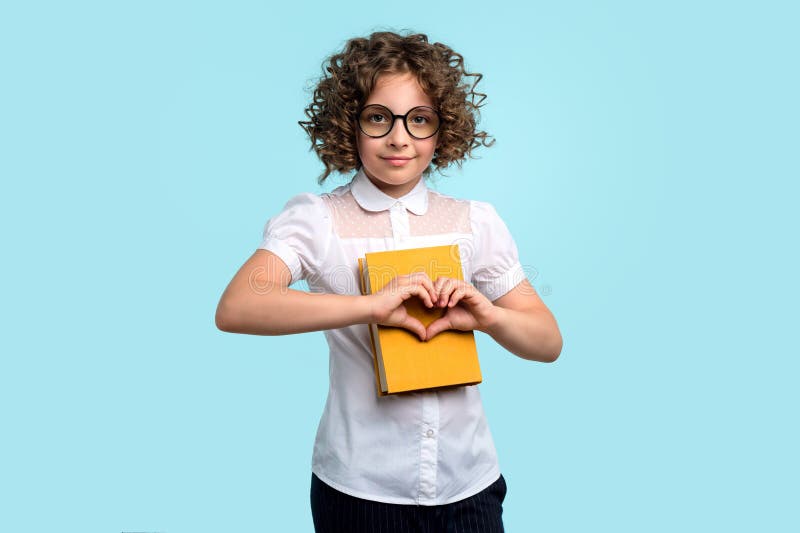Schoolgirl Holds Yellow Book Stock Image Image Of Face Elementary