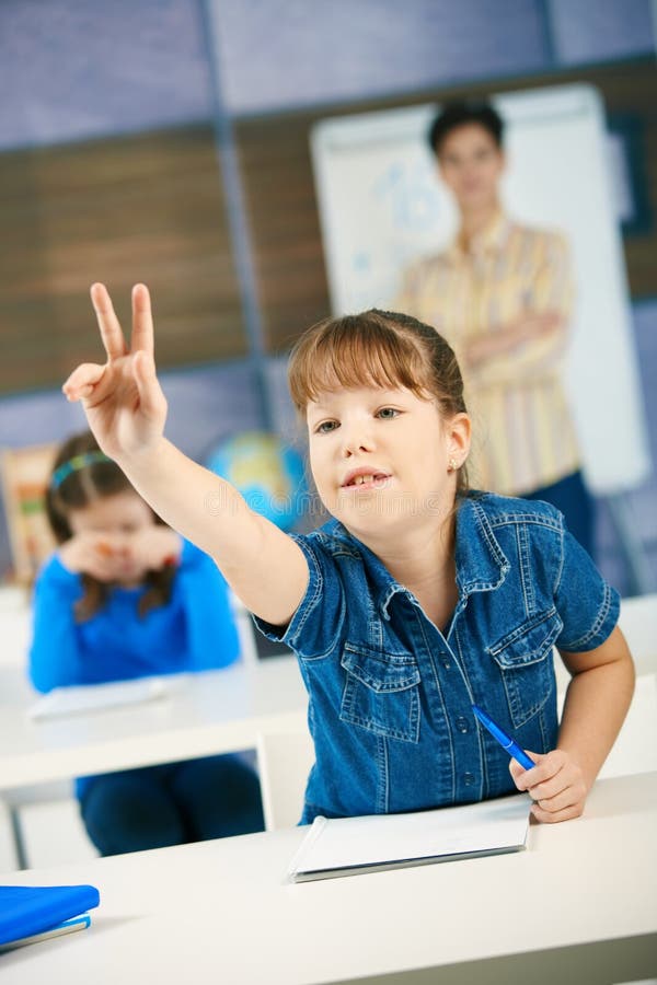 Boy Raising Hand during Lesson Stock Image - Image of study, workday ...