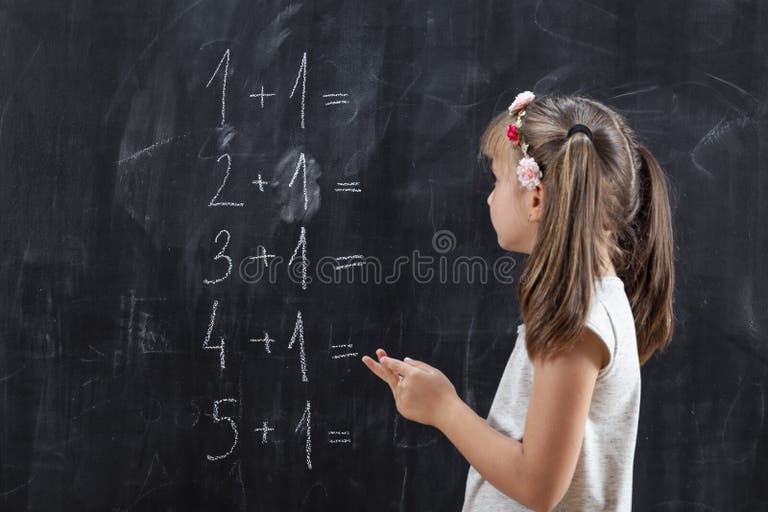 Schoolgirl Solving Math Problems Stock Photo - Image of chalkboard ...