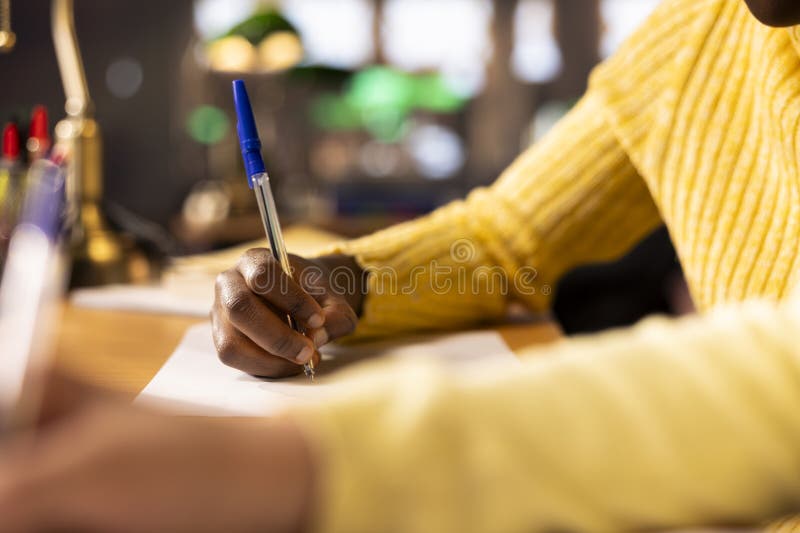 Schoolgirls Engaged in Writing Ideas for the Essay in the Library Stock ...