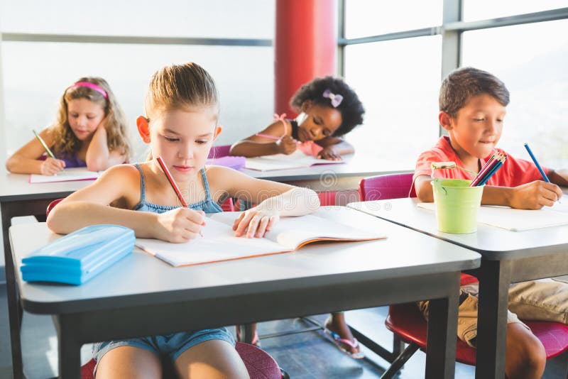 Schoolkids Doing Homework in Classroom Stock Image - Image of male ...