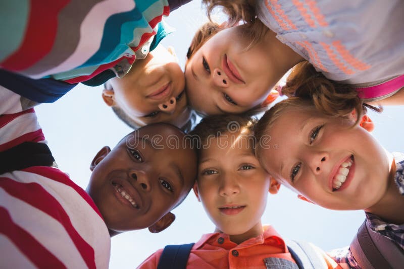 Schoolkids Forming Huddle in Campus Stock Image - Image of bonding ...